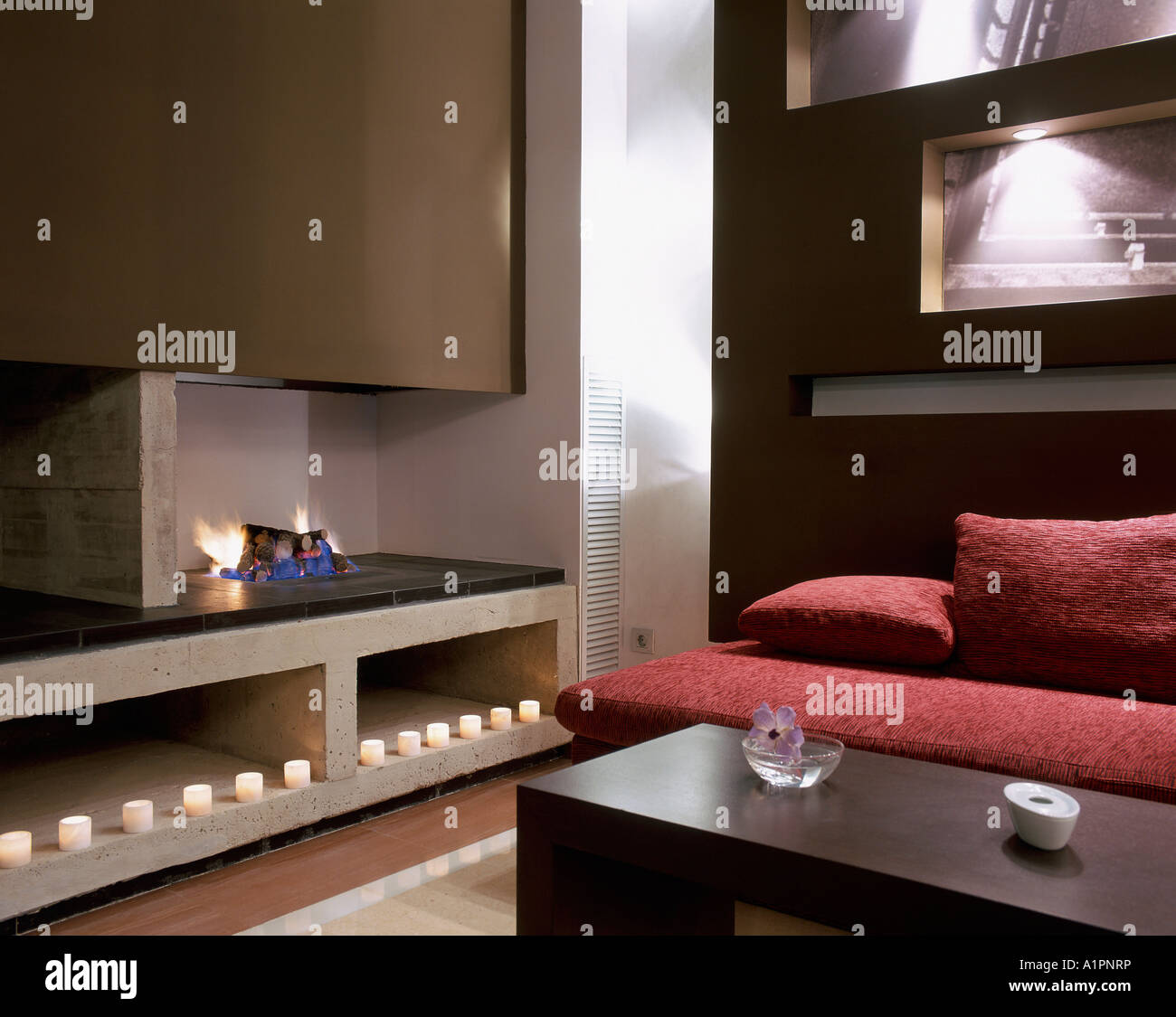 View of a fireplace in a living room Stock Photo - Alamy