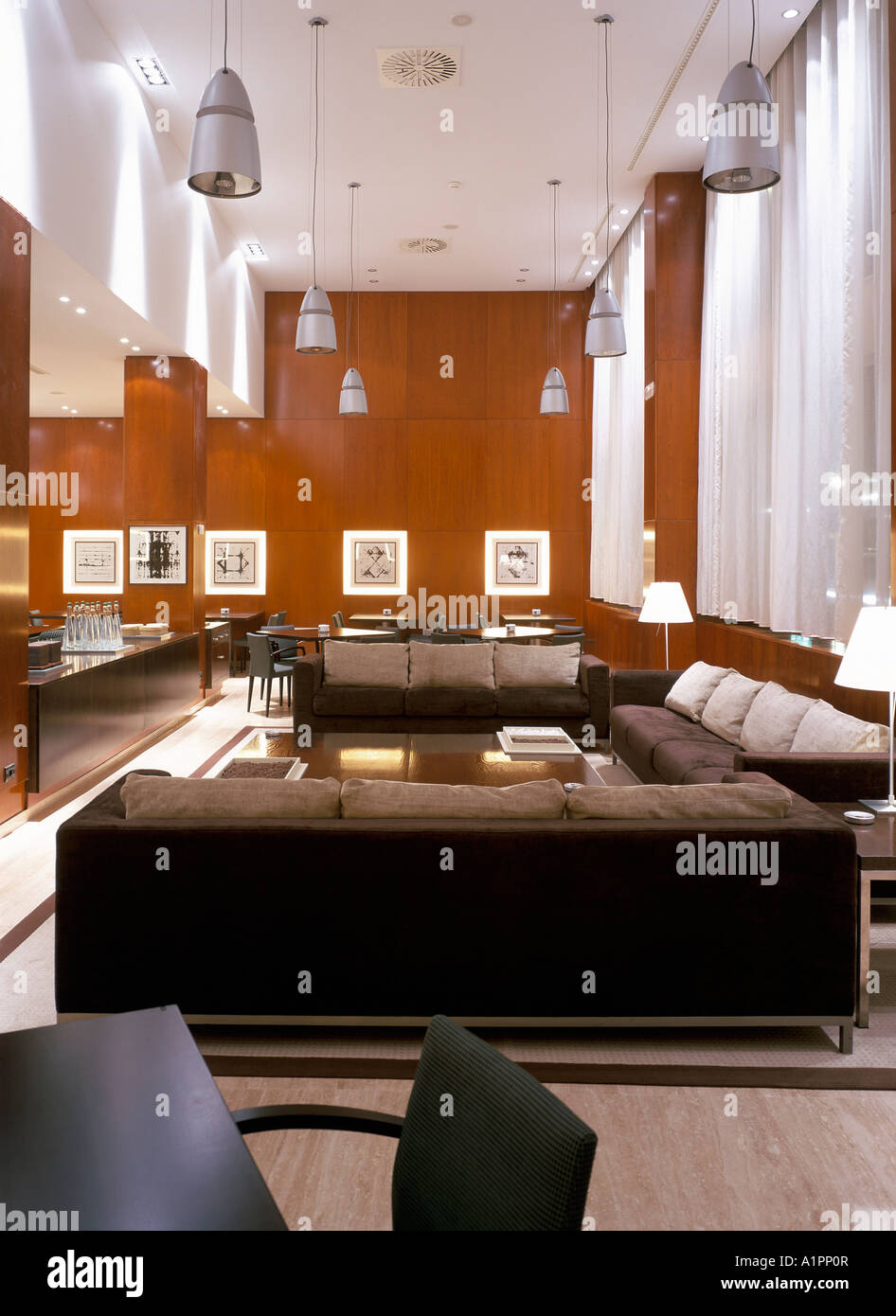 View of a lounge with comfortable seating arrangement Stock Photo - Alamy