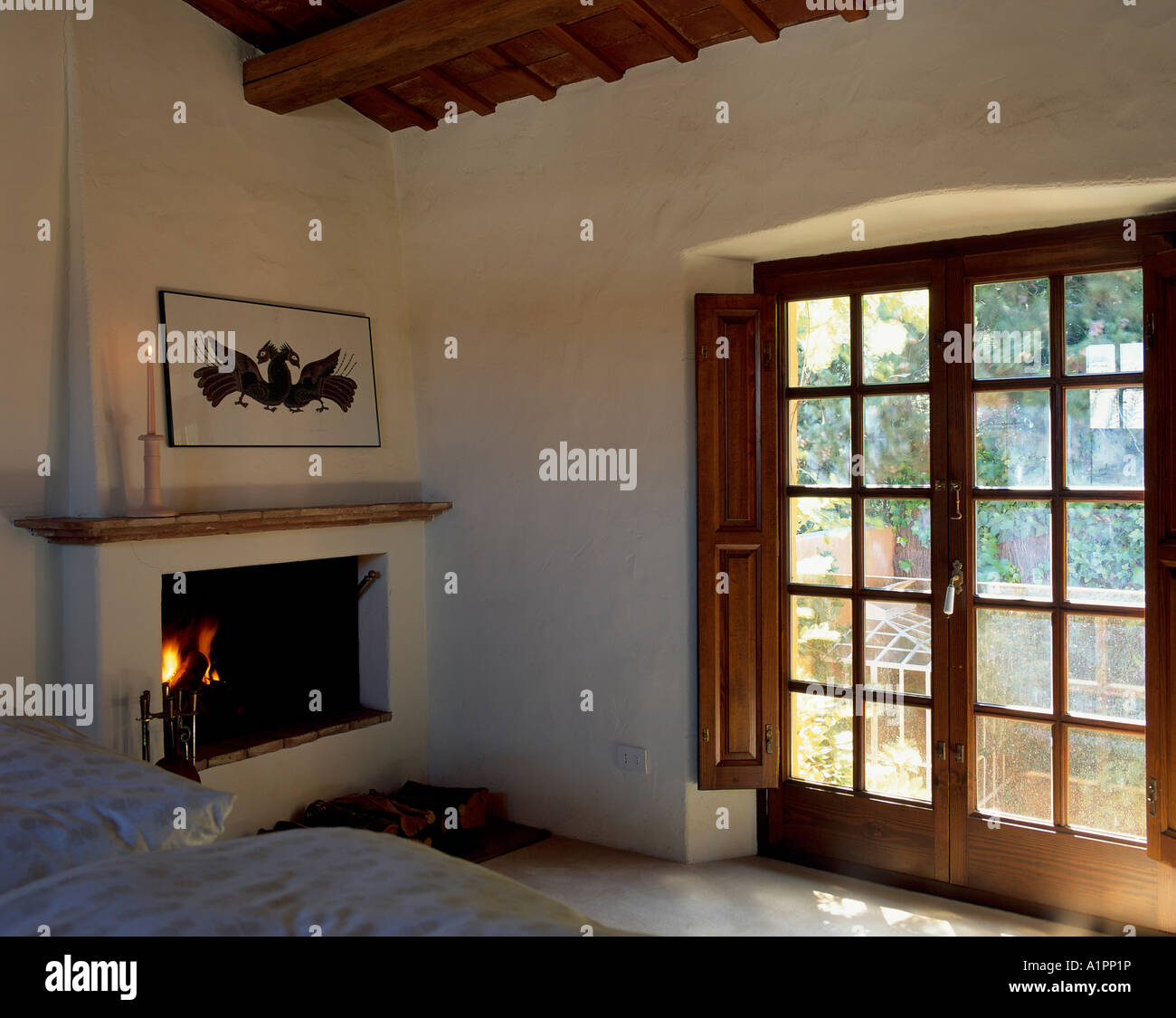 Lighted fire in fireplace in hi-res stock photography and images - Alamy