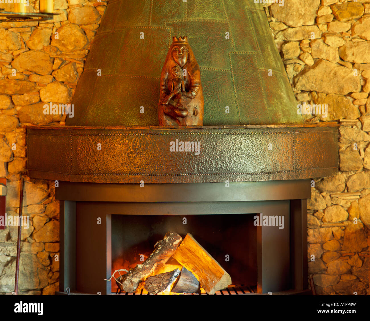 View of a fire set ablaze in a fireplace Stock Photo - Alamy