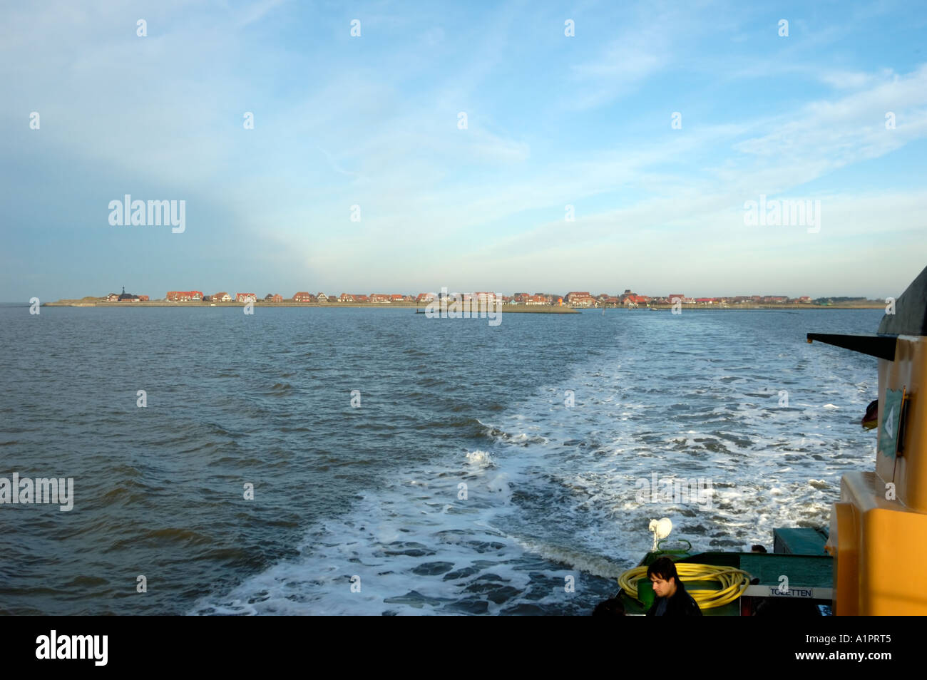 View of the German island of Baltrum from a ferry leaving Stock Photo ...
