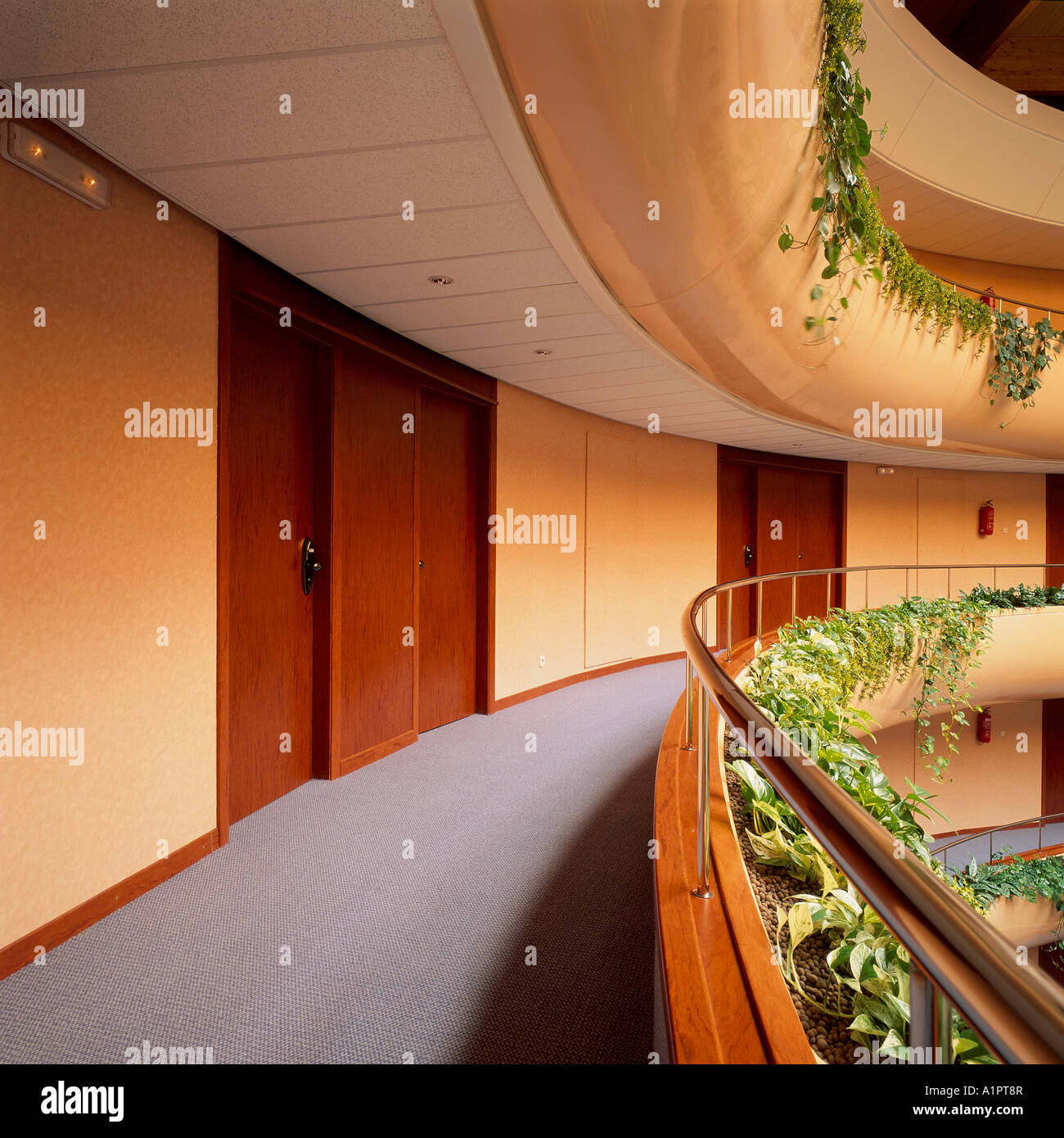 View of a passageway in an office building Stock Photo - Alamy