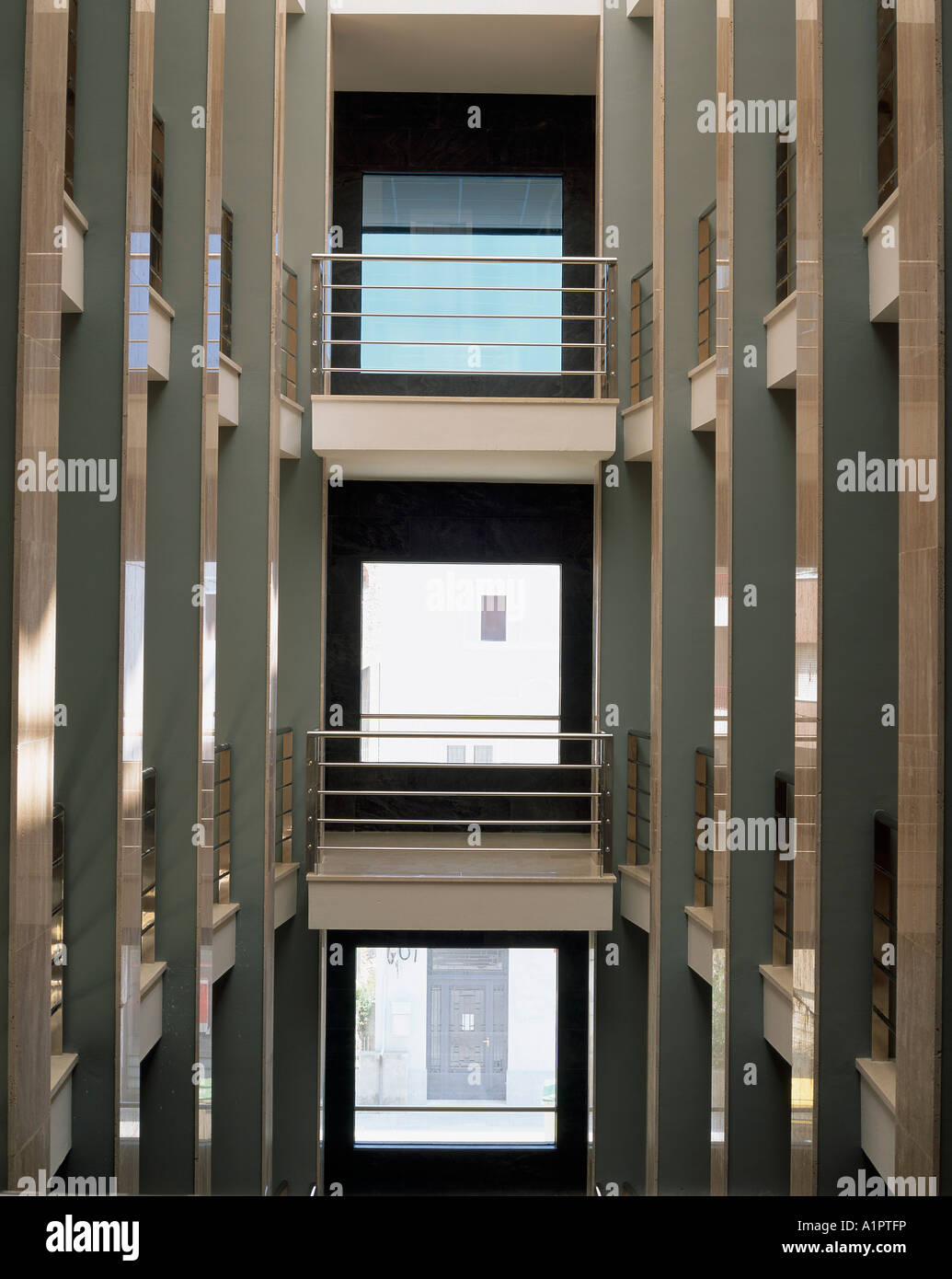 View of an atrium of an office building Stock Photo - Alamy