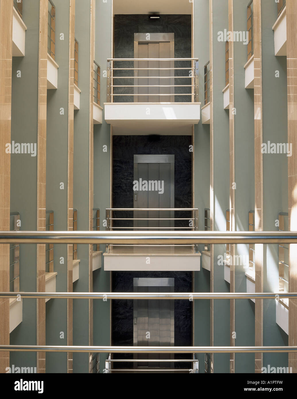 View of an atrium of an office building Stock Photo - Alamy