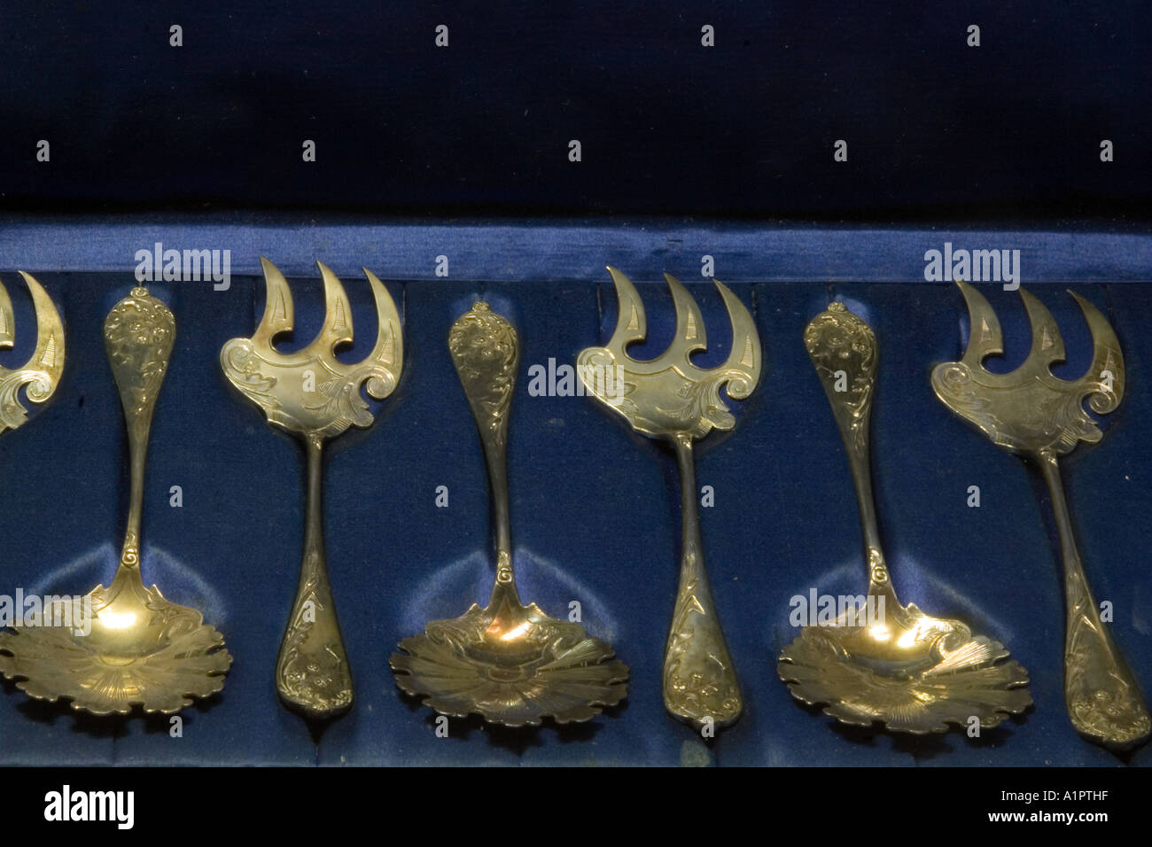 Stock photo of antique desert silverware set in blue felt box Three ...
