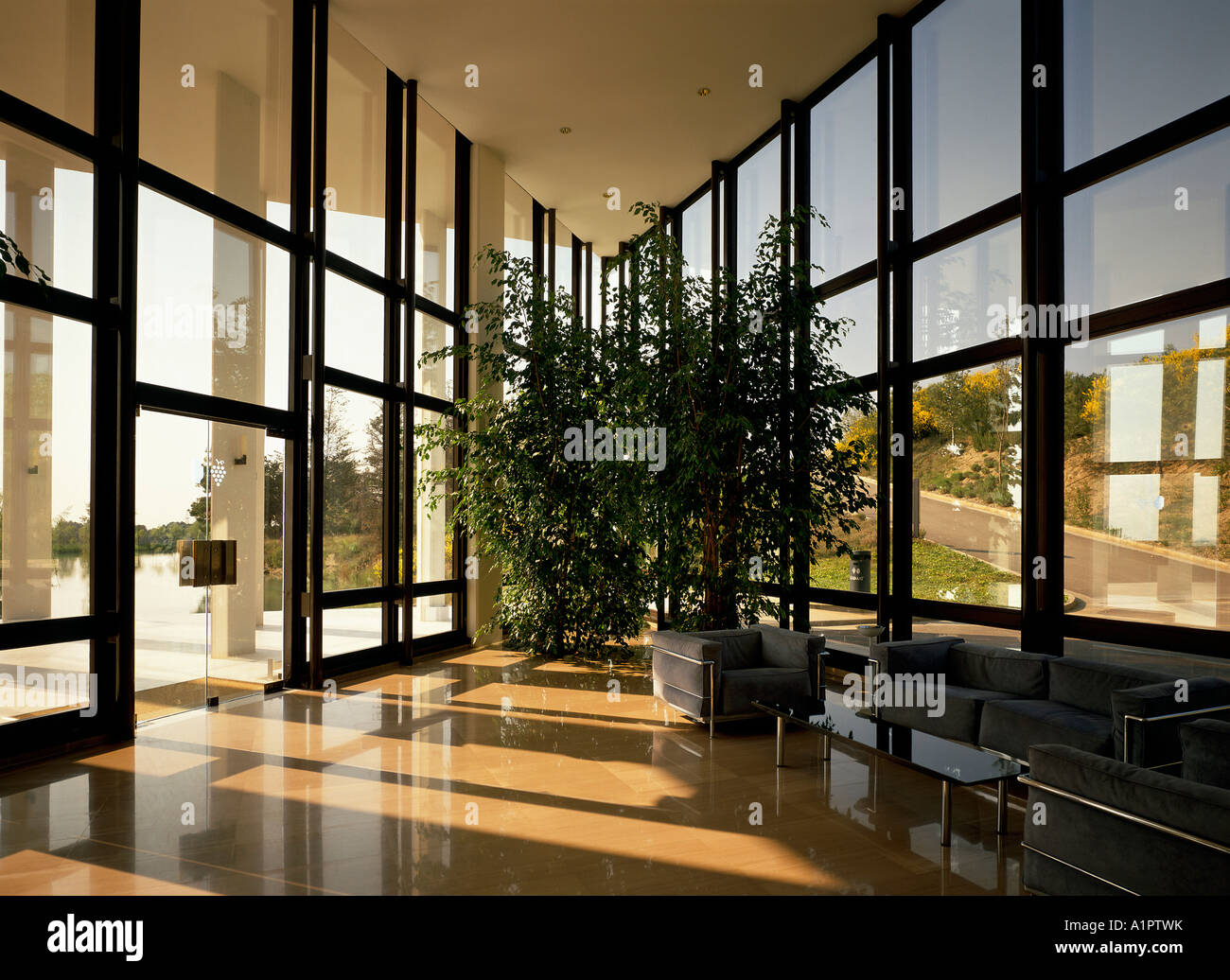View of a lounge with glass walls Stock Photo - Alamy