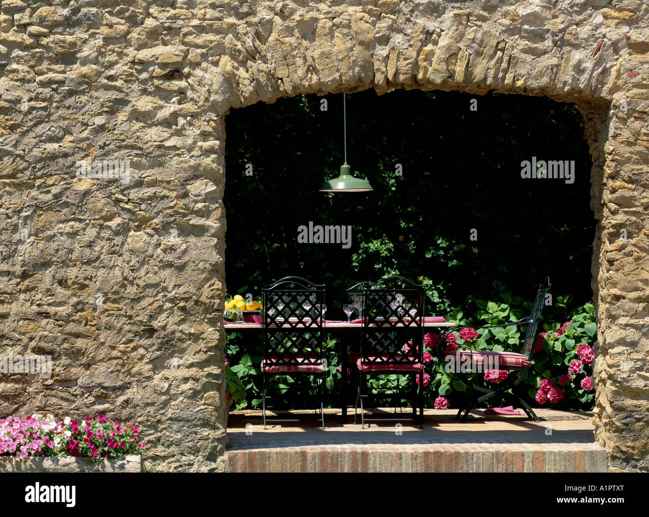 View of a well arranged dining table on a sunny day Stock Photo - Alamy