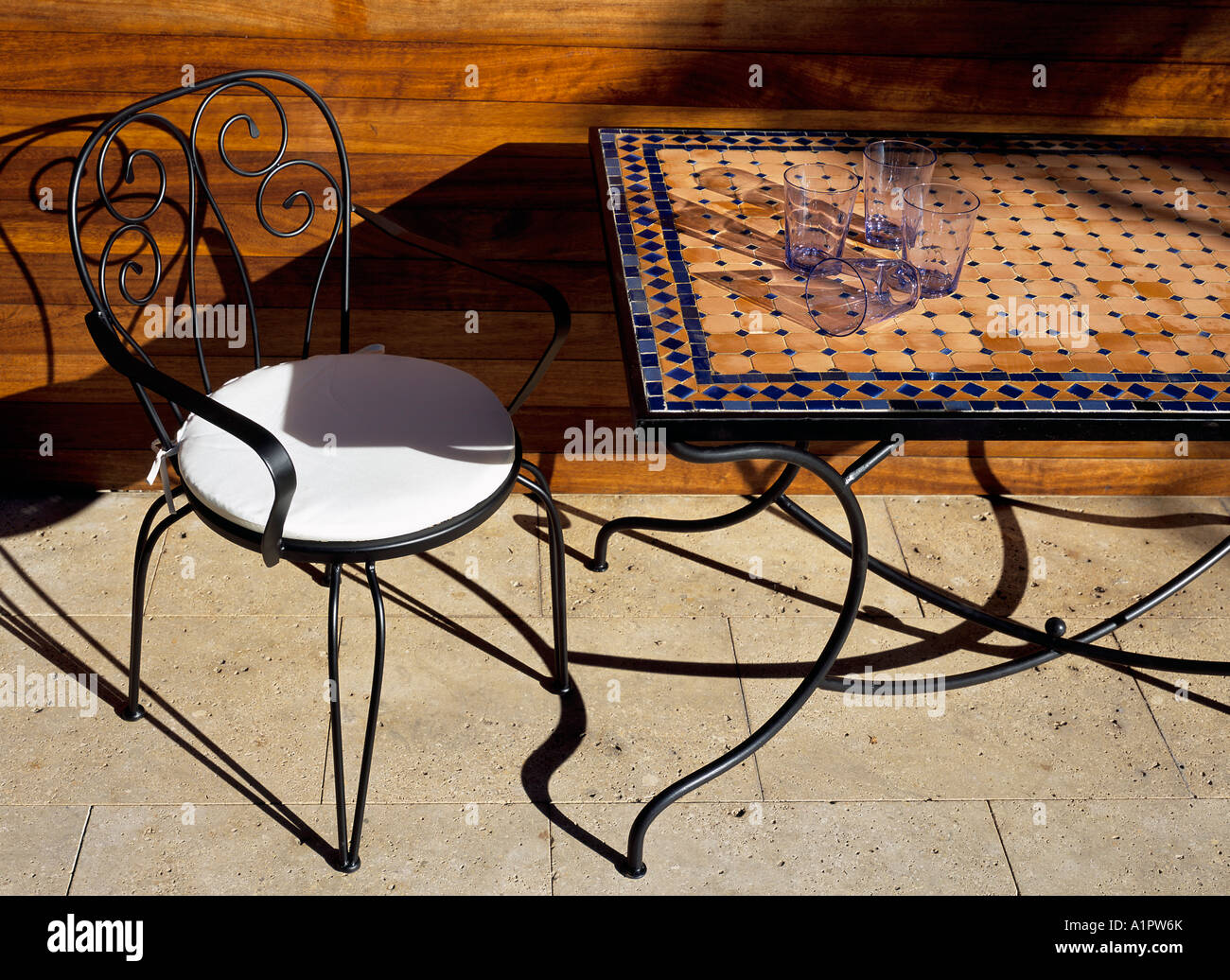 View of a chair and a dining table Stock Photo - Alamy