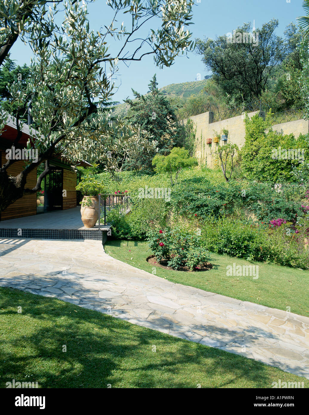 View of a walkway leading to a house Stock Photo - Alamy