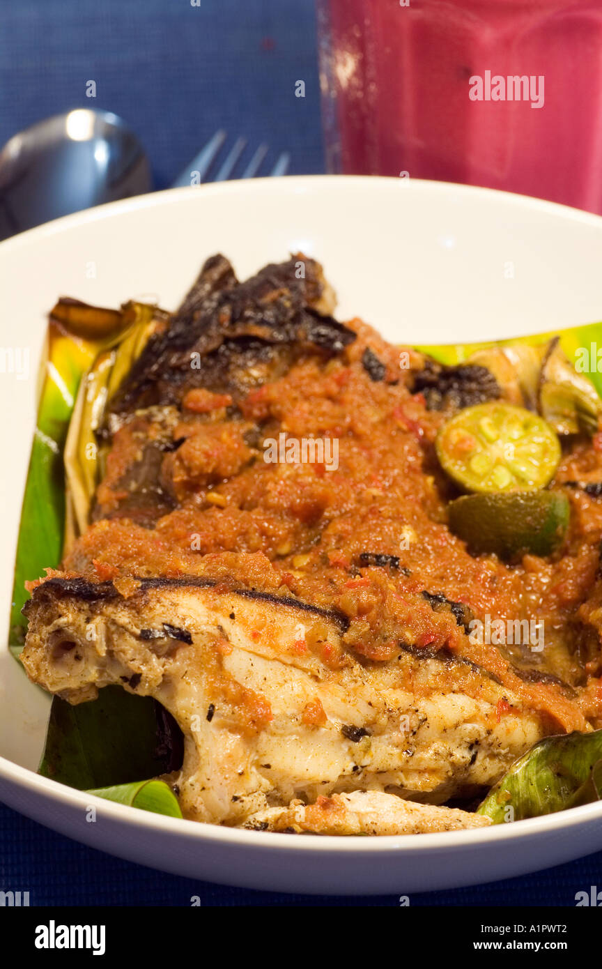 "Ikan Bakar" (grilled sting ray) Malaysian dish Stock Photo - Alamy