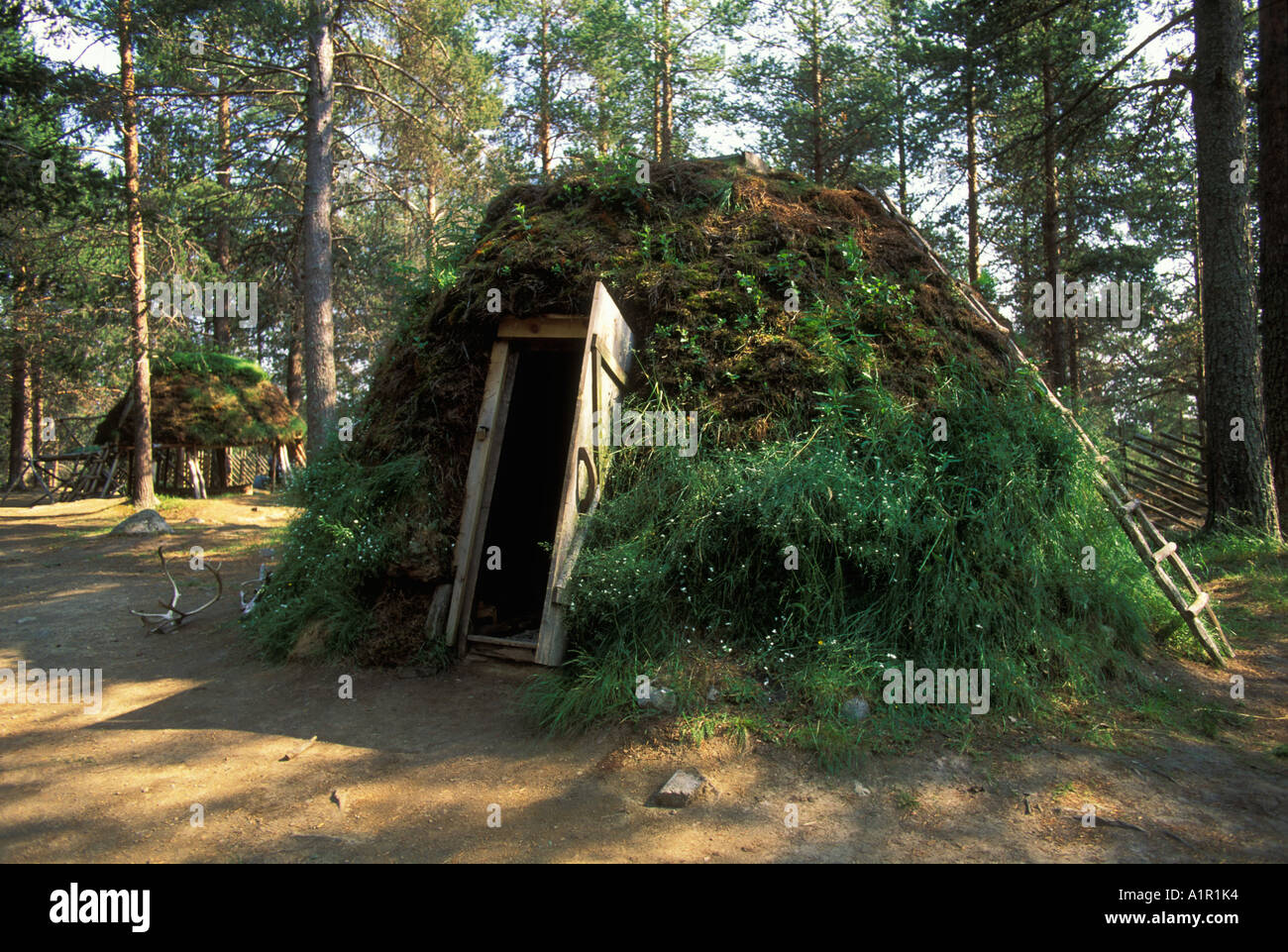 A traditional Saami home made of peat at an outdoor museum in ...