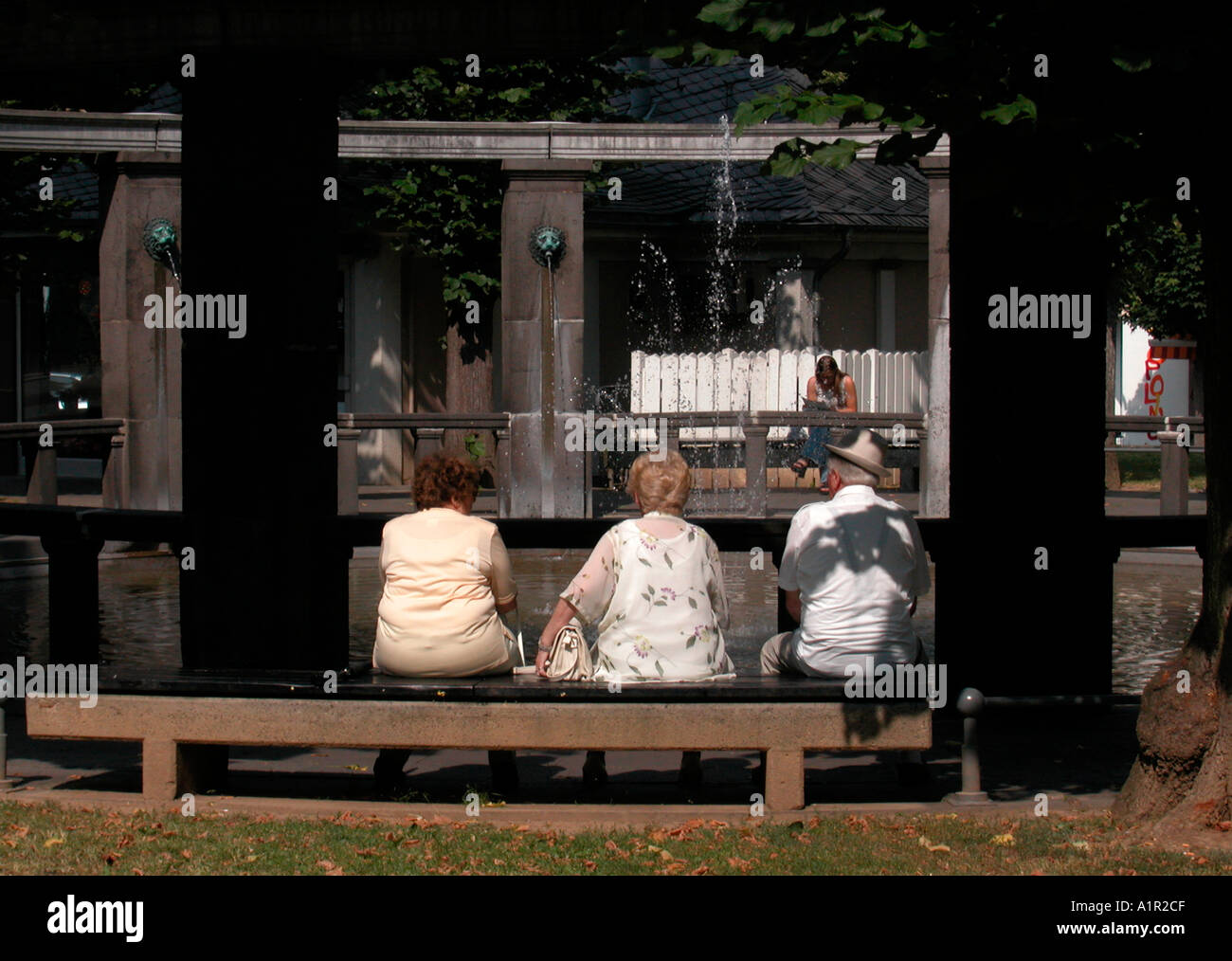 Sitting on a bank hi-res stock photography and images - Alamy