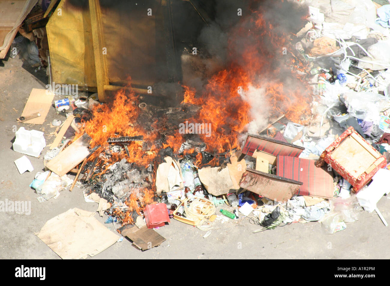 Burning trash and debris causing pollution and smoke Stock Photo - Alamy