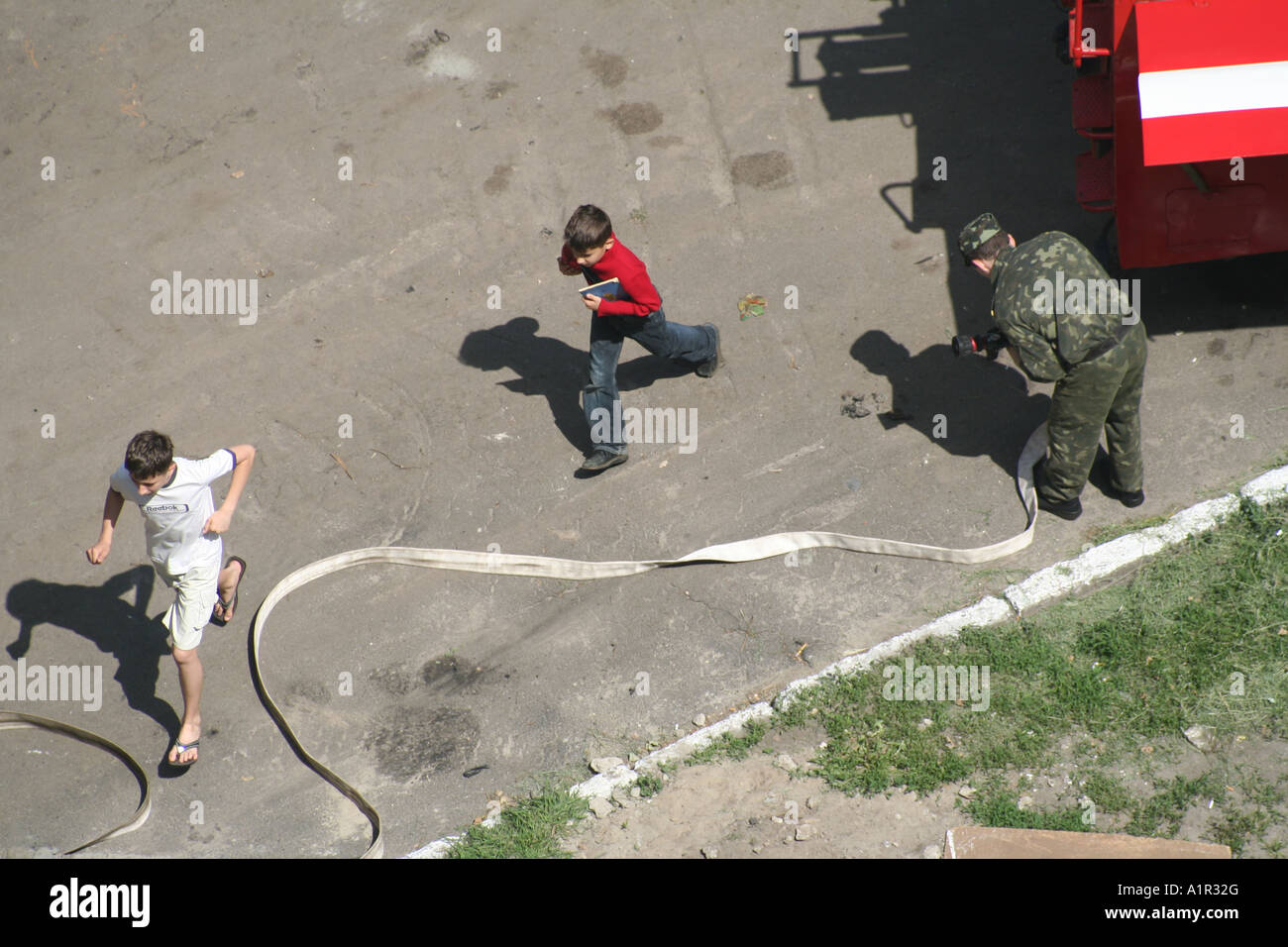 Firefighter running to truck hi-res stock photography and images - Alamy