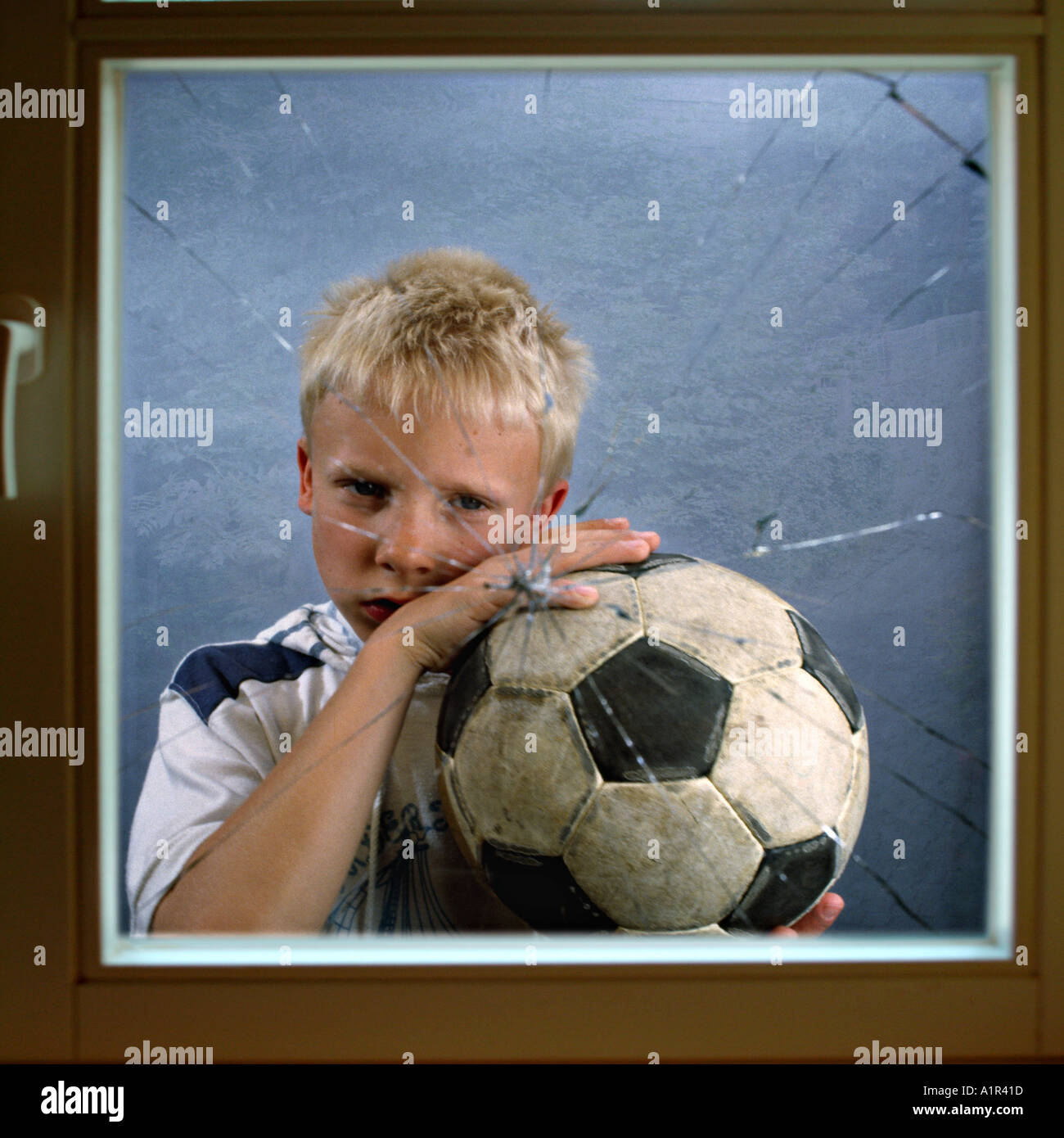 Broken window ball hi-res stock photography and images - Alamy
