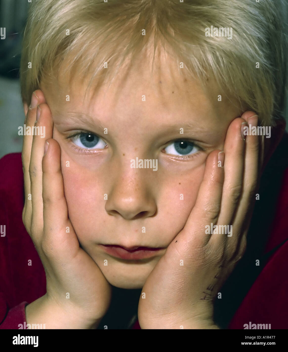 portrait of a fair haired boy in his thoughts MR Stock Photo - Alamy