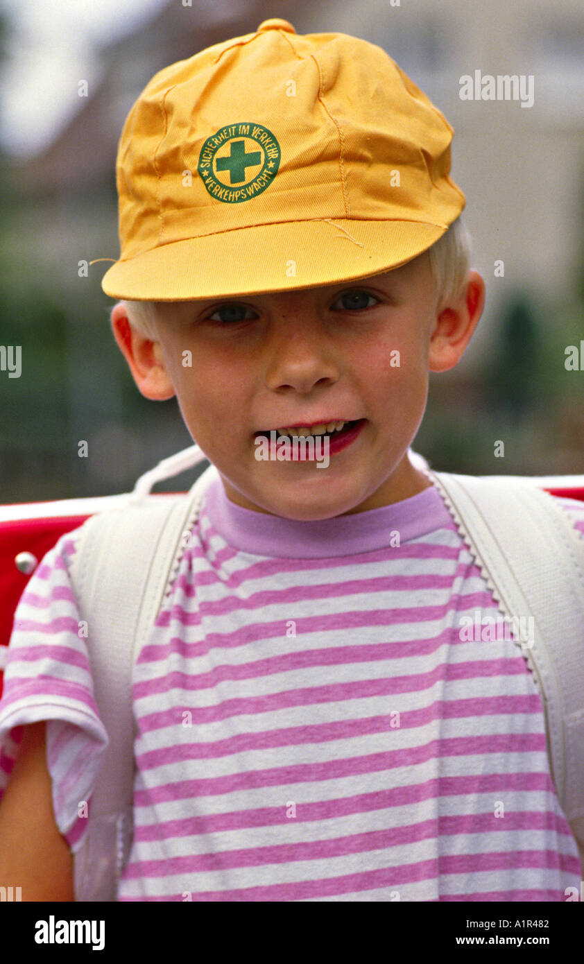 school beginner little boy with a signal cap and school bag MR Stock ...