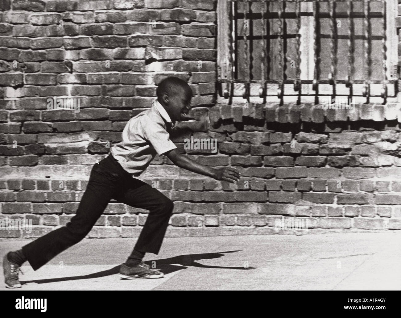 Running escaping street hi-res stock photography and images - Alamy