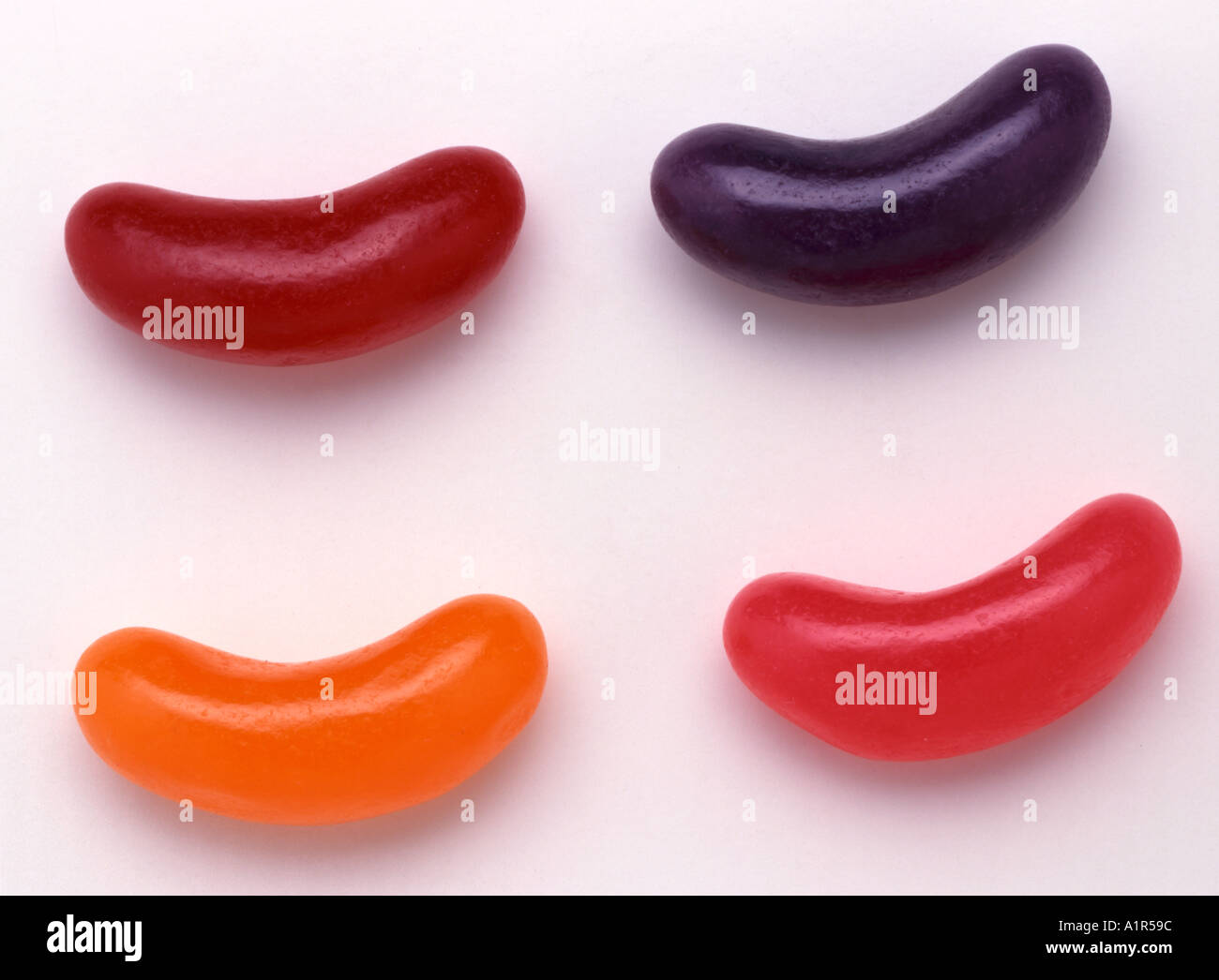 four different coloured jelly beans Stock Photo - Alamy