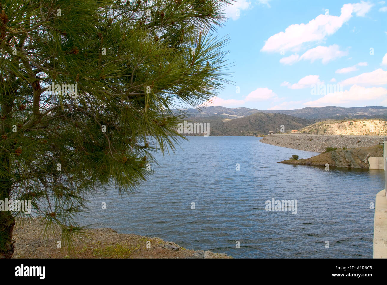 full mountain water reservoir in southern Cyprus Stock Photo - Alamy