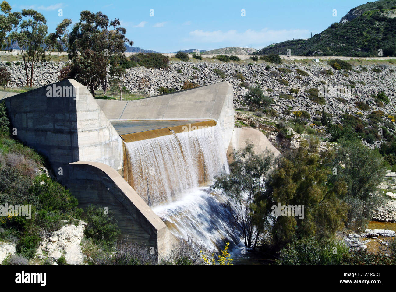 Water flowing through the overflow sluice at the Germasogeia dam cyprus ...