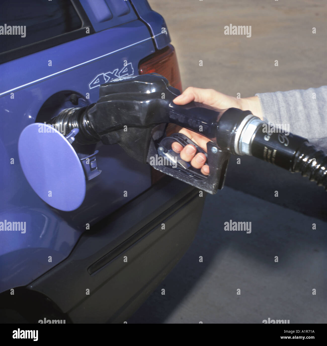 Black hand pumping gas hi-res stock photography and images - Alamy