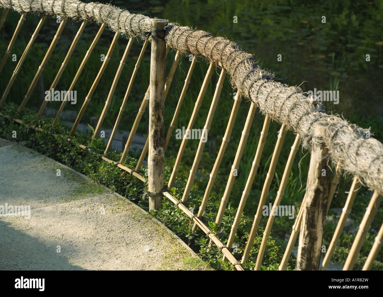Railing next to footpath Stock Photo - Alamy