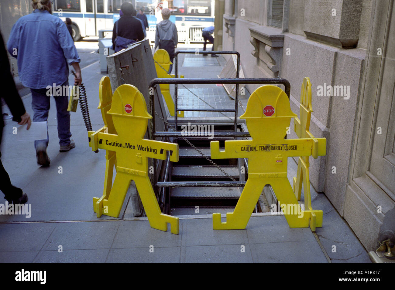 Man at work road sign Stock Photo - Alamy
