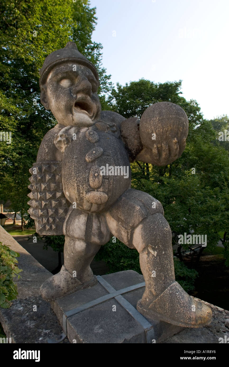 Baroque dwarf statue on footbridge to in Zwerglgarten, part of Mirabell ...