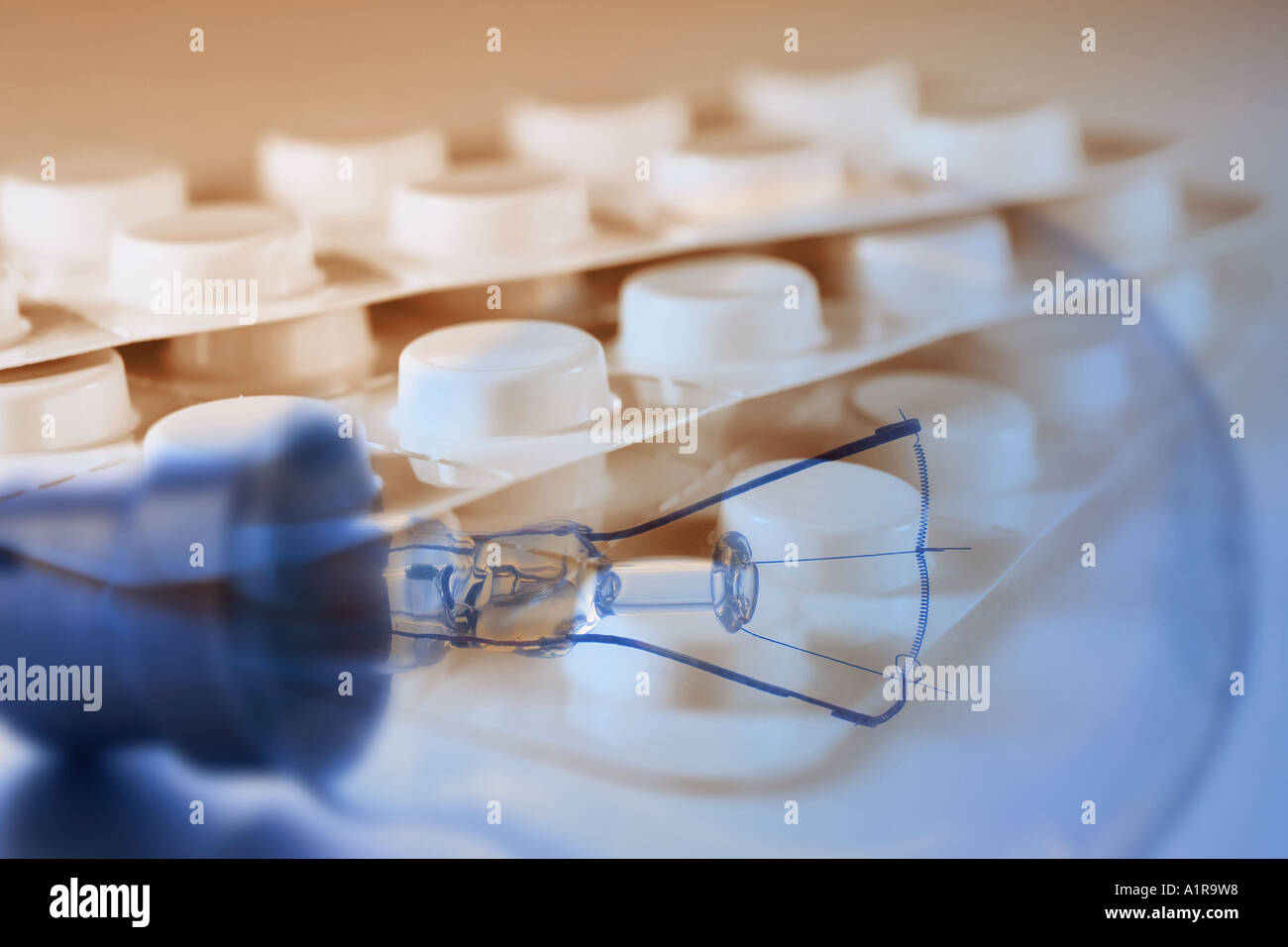 Pills and Light Bulb Stock Photo - Alamy