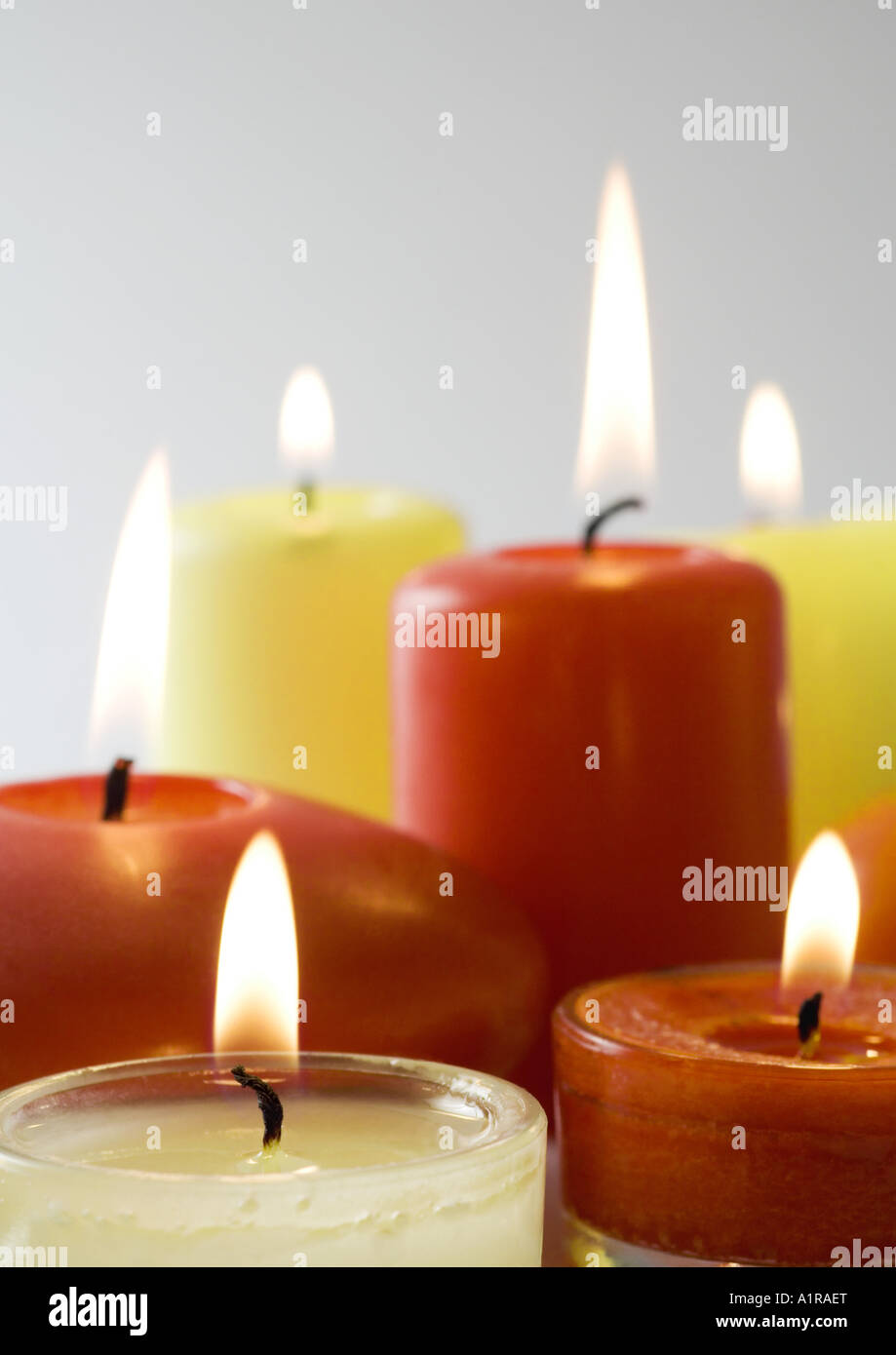 Close up burning colourful candles hi-res stock photography and images ...
