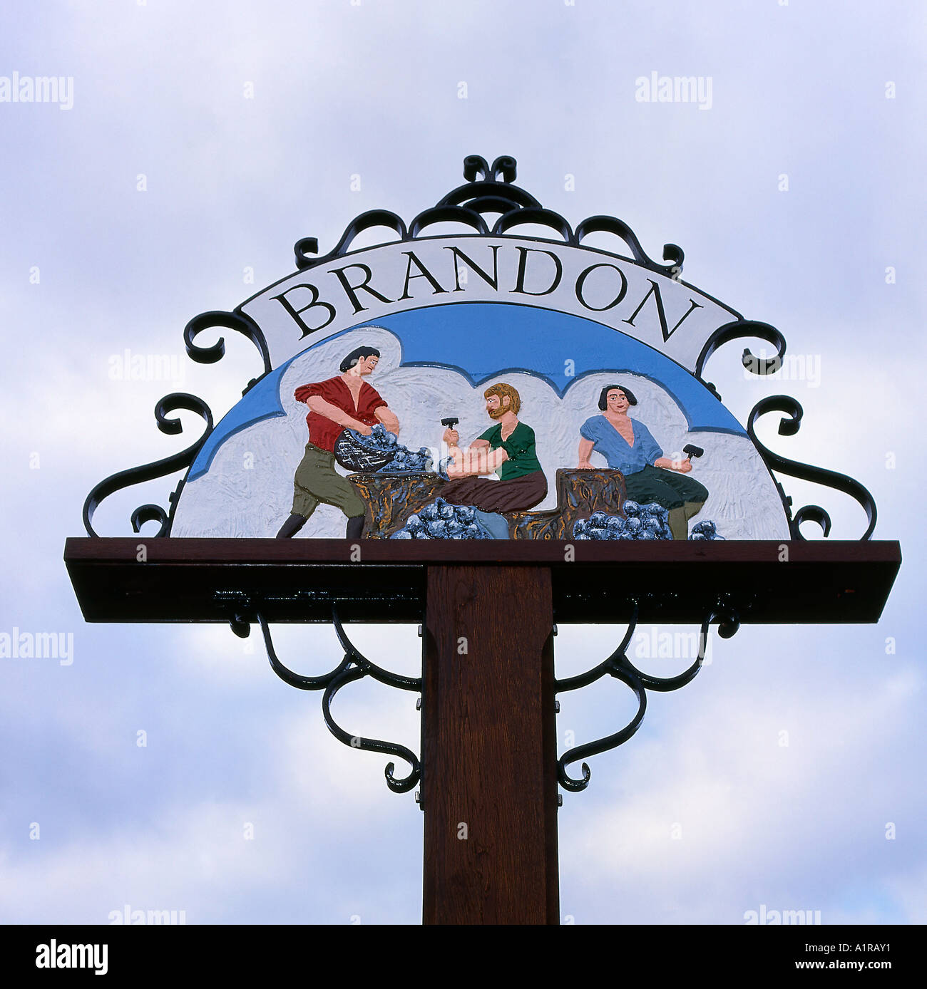 Village Sign (showing flint knapping) for Brandon in Suffolk. England ...