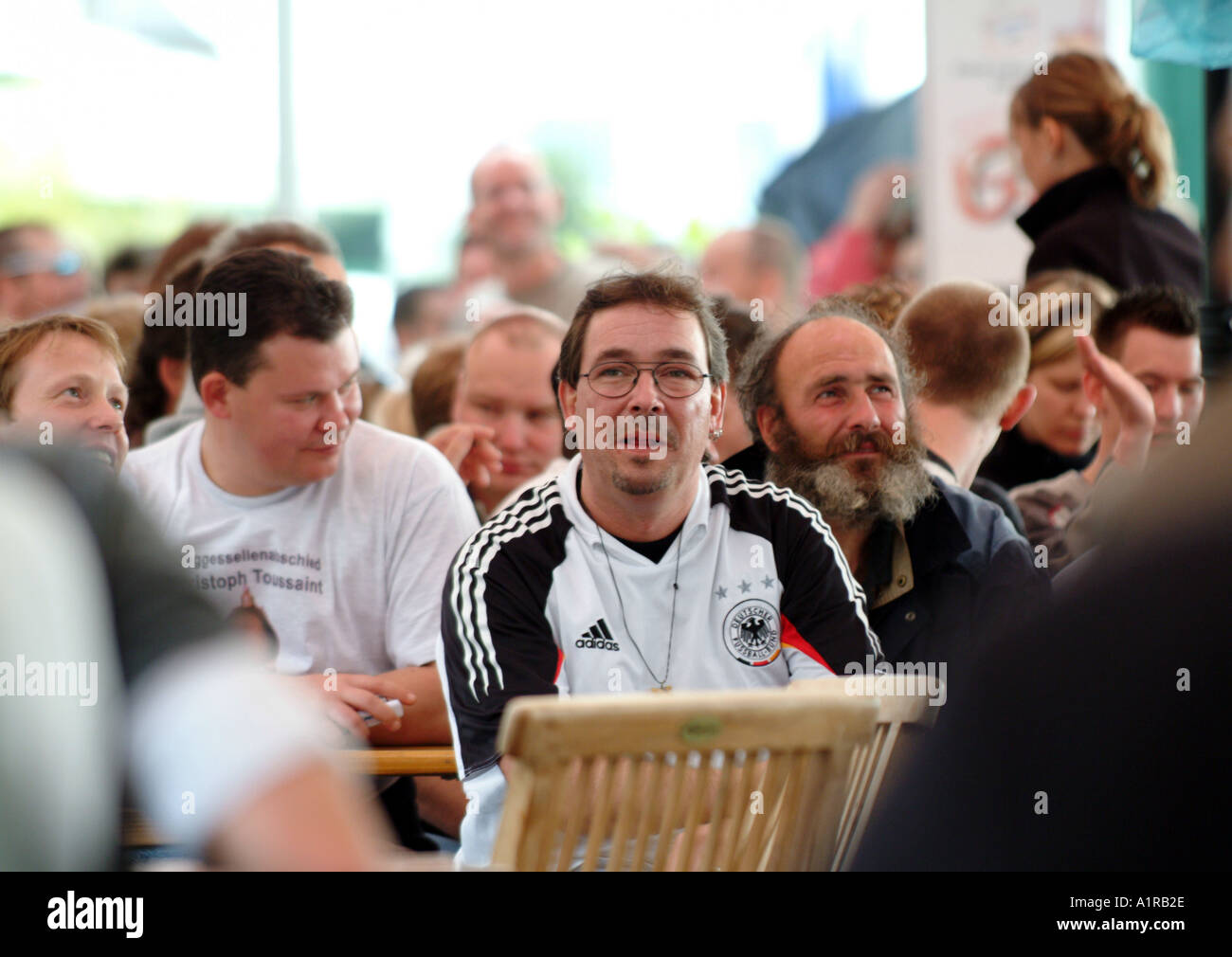 fans fan crowd male man men promenade bar outdoor outside society ...