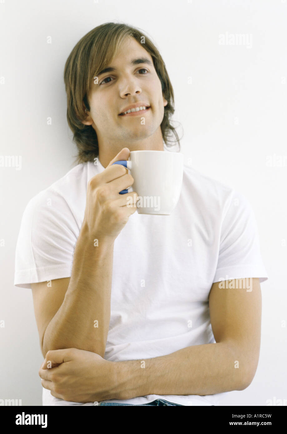 Man with coffee cup Stock Photo - Alamy