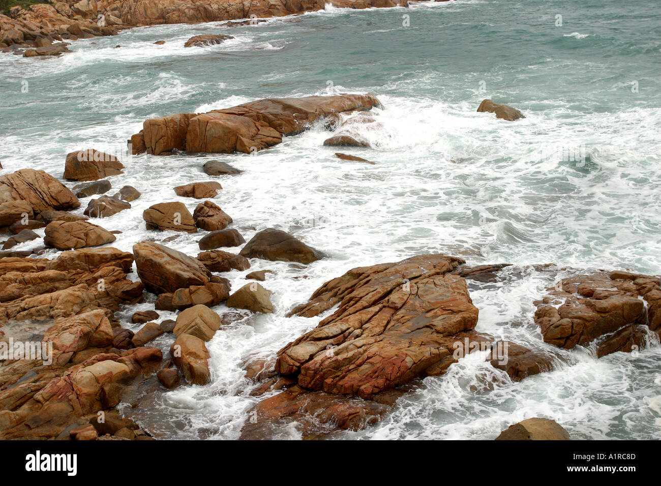 Giant wave Rocky beach Impact sea mountain Spray Stock Photo - Alamy