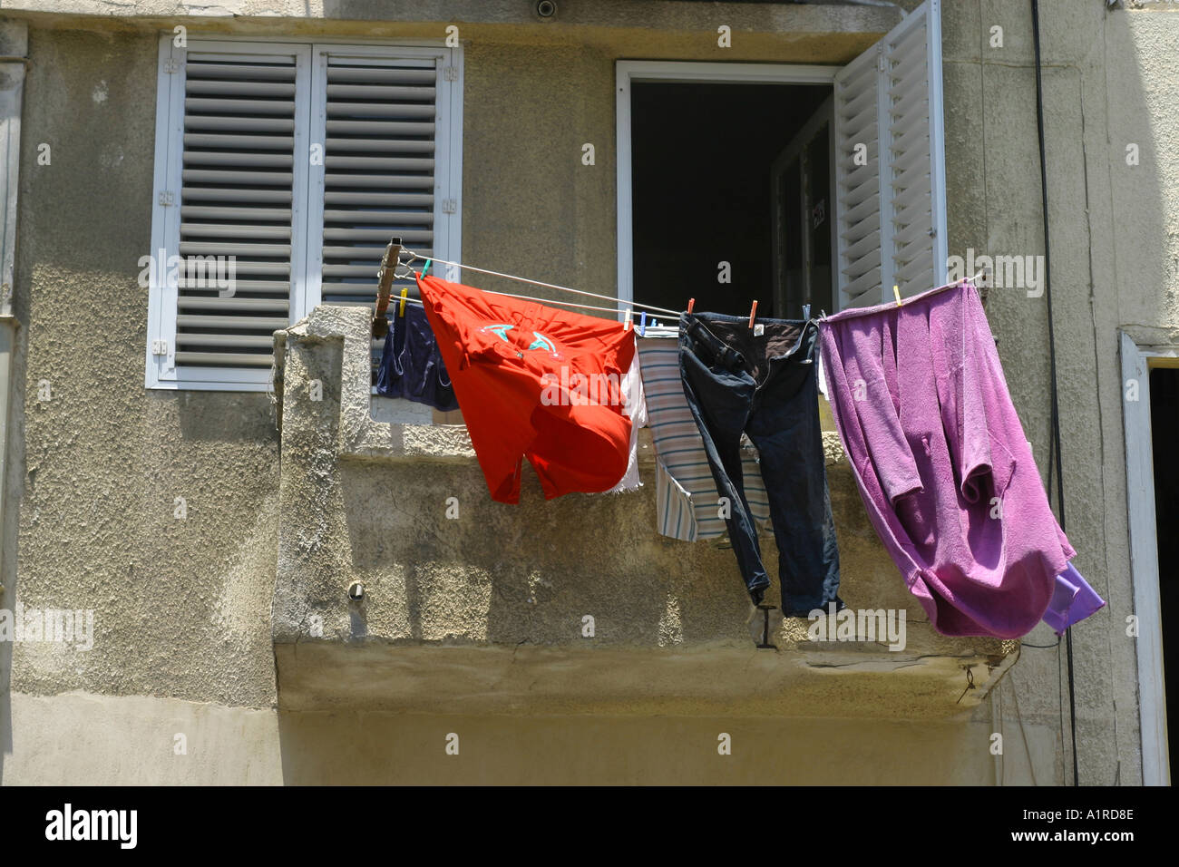 Balcony wet washed clothes Tel Aviv Israel Stock Photo - Alamy