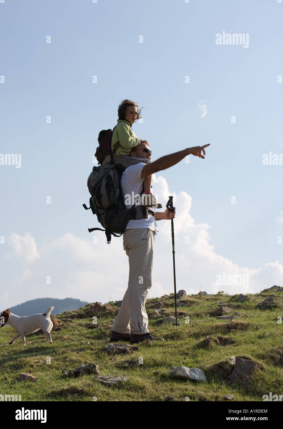 Girl riding on mans shoulders hi-res stock photography and images - Alamy