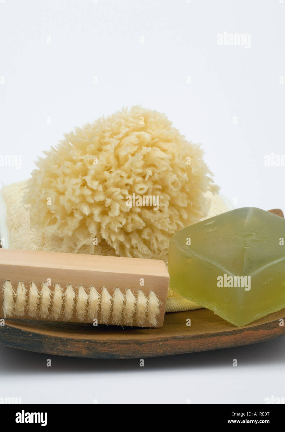 Grooming products, bar of soap, brush, and sponge Stock Photo - Alamy