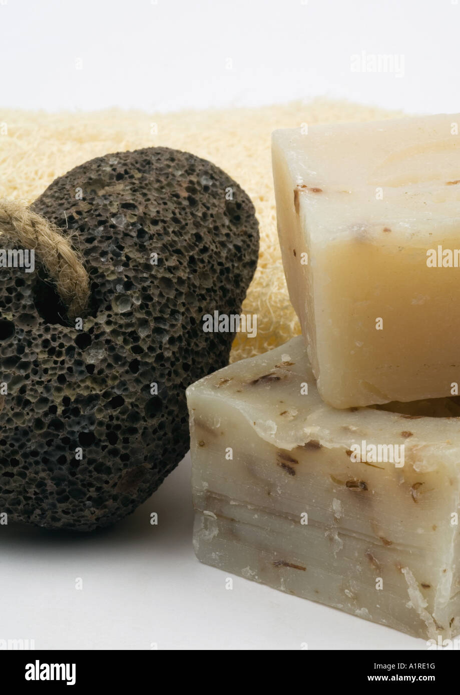 Bars of soap, pumice stone and loofah Stock Photo - Alamy
