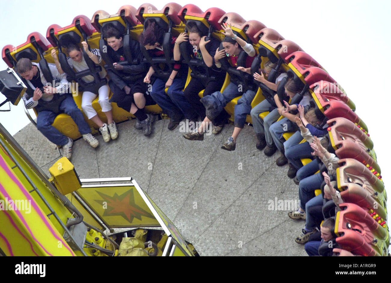 Passengers on a thrill funfair ride Stock Photo - Alamy