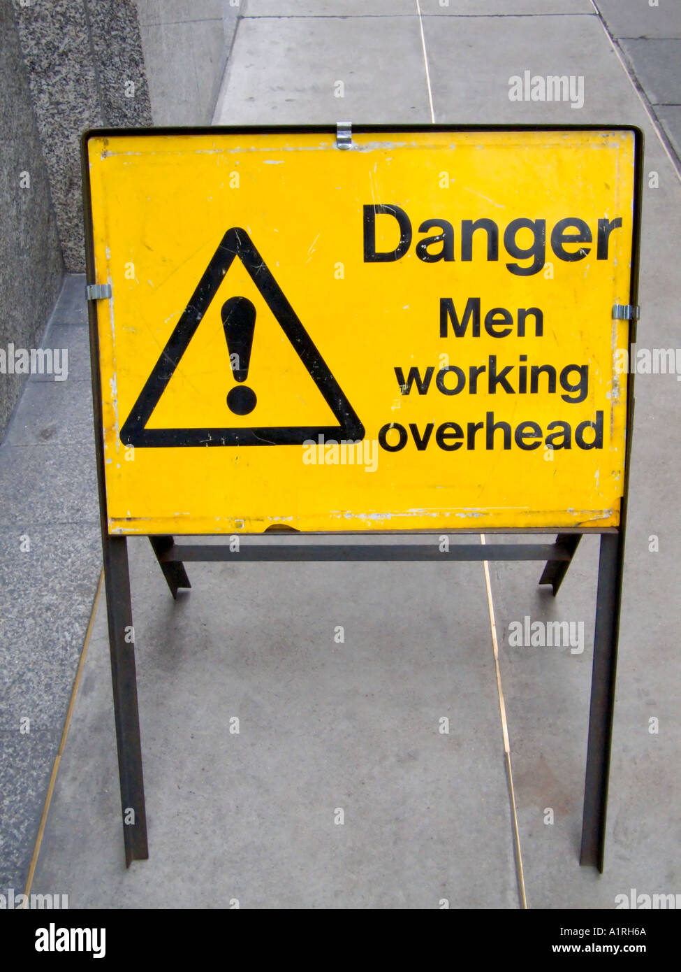 danger men at work sign Stock Photo - Alamy