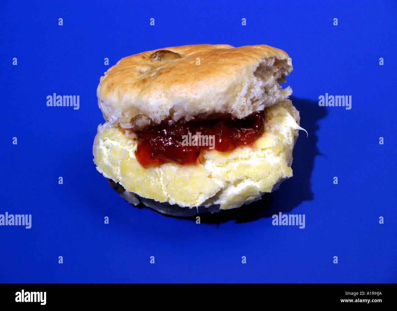 Cornish clotted cream tea scone and jam Stock Photo - Alamy