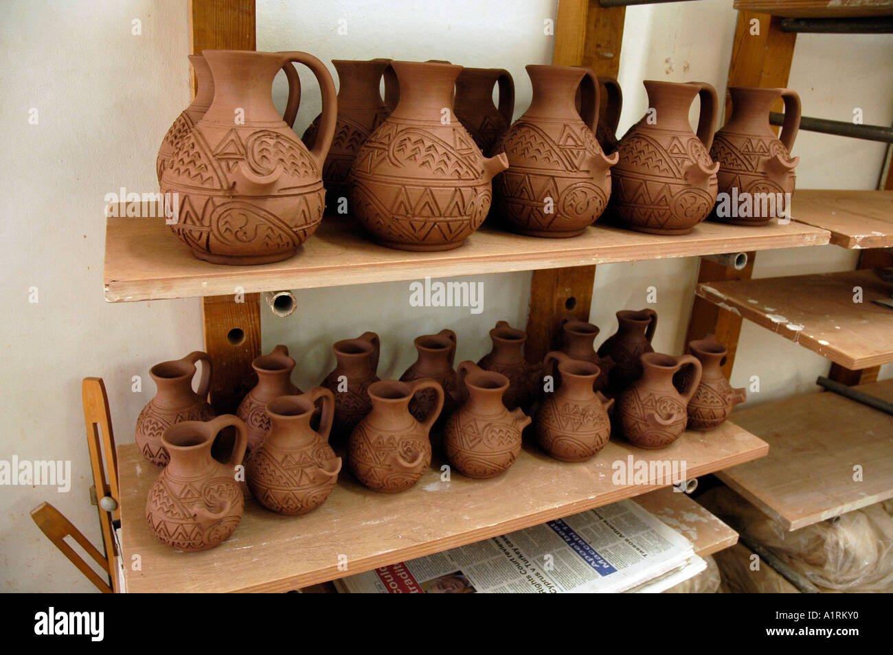 Examples of pots in traditional Cypriot design, drying before being ...