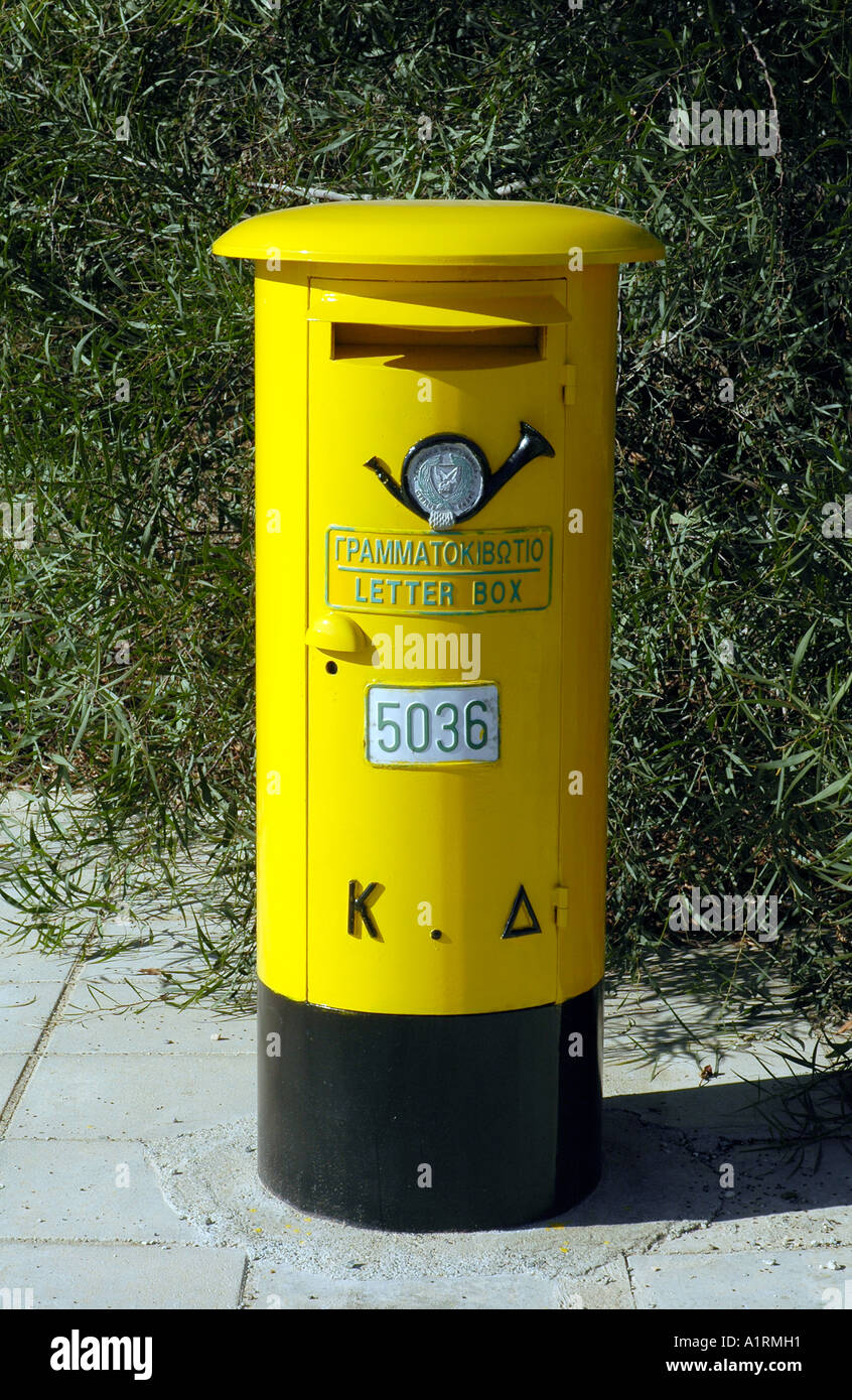 Yellow post box, Cyprus Stock Photo - Alamy