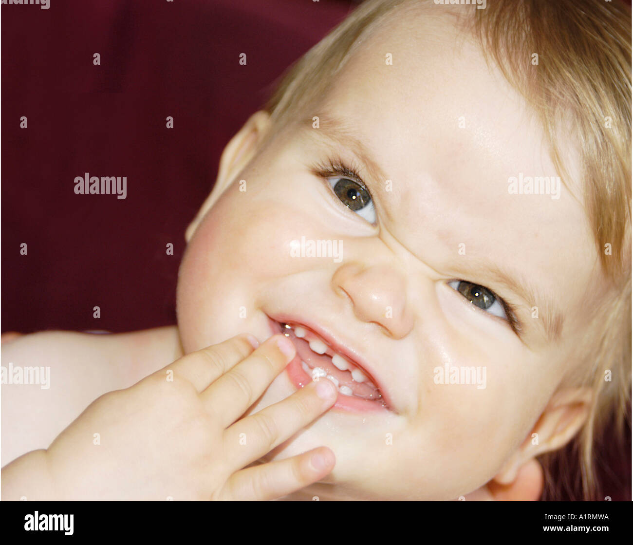 Cheeky Face of Baby Boy Stock Photo - Alamy
