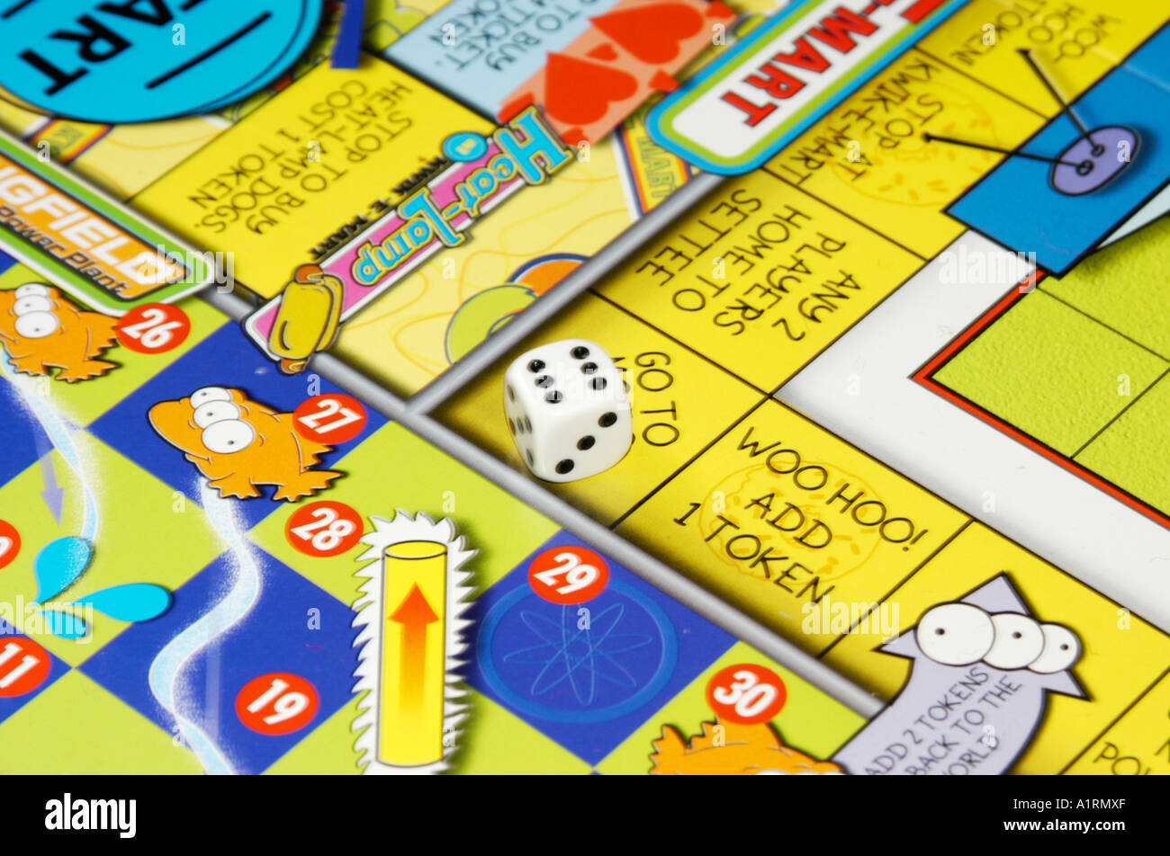 Dice on Board Game Stock Photo - Alamy