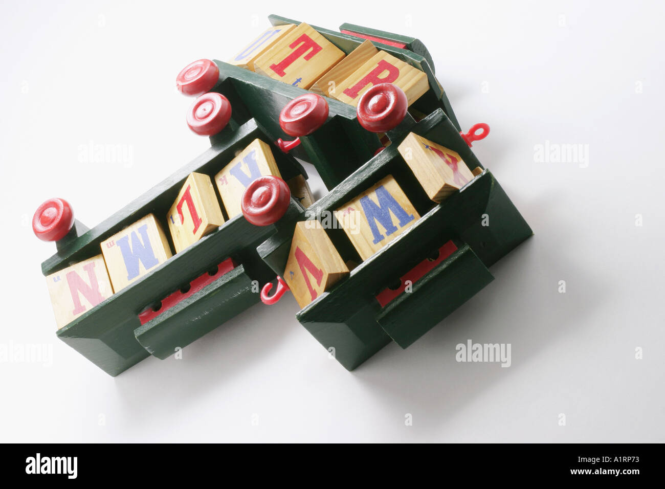 Fallen Toy Train with Alphabet Blocks Stock Photo - Alamy