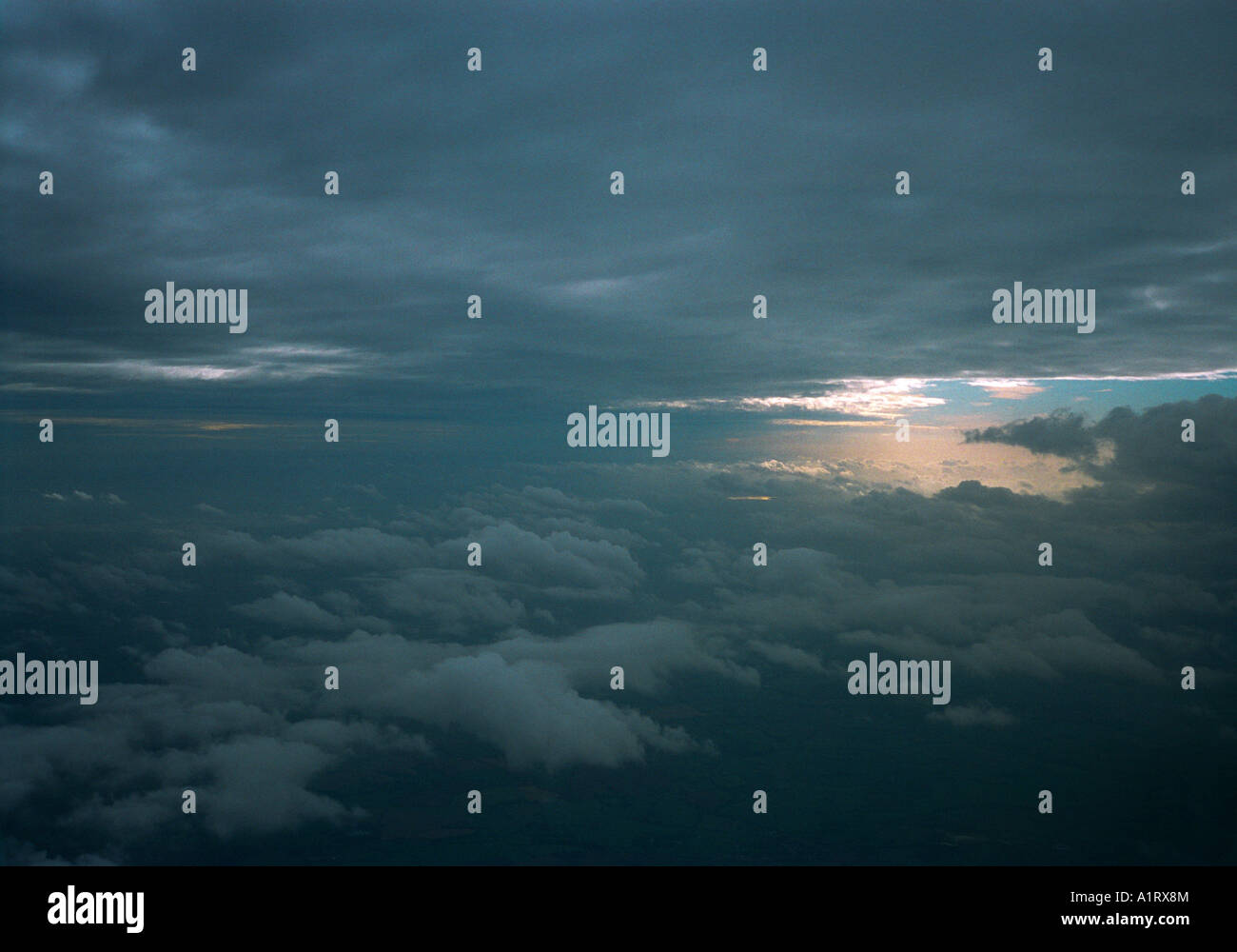 View of clouds through plane window Stock Photo - Alamy