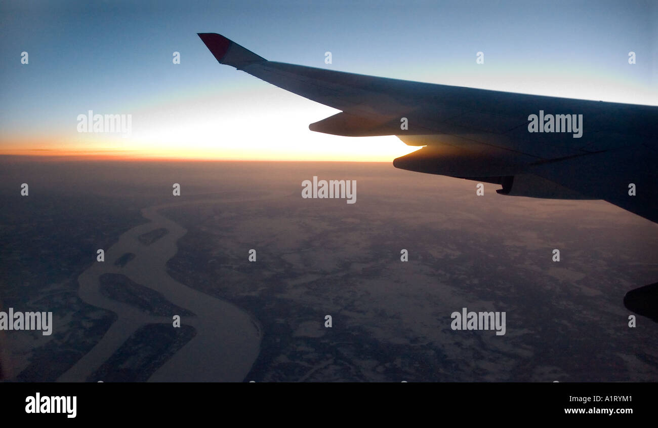 Wing of a Boeing 747 Flying over Siberia Northern Russia en route from ...