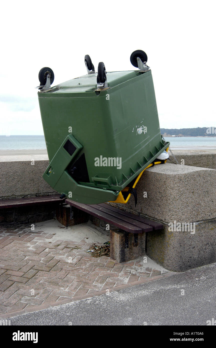 Upturned wheelie bin on seafront Stock Photo - Alamy